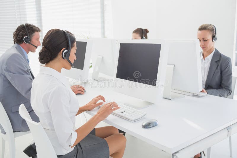 Computers and Headsets from a Call Center Stock Image - Image of office ...
