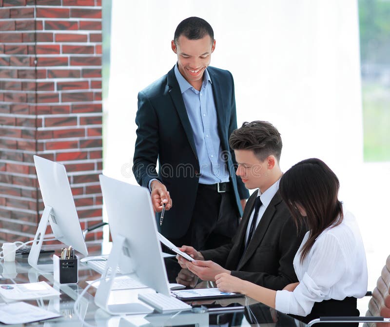 Business Team Working with Documents in a Modern Office. Stock Image ...