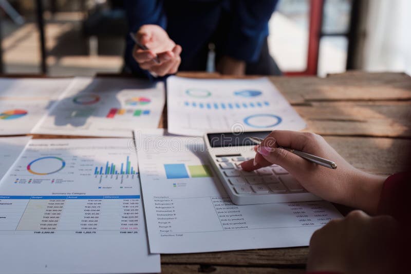 Business Team Working with Financial Document at Office. Analysis, Discussion and Brainstorming ...