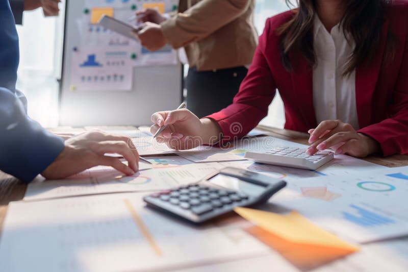 Business Team Working with Financial Document at Office. Analysis ...