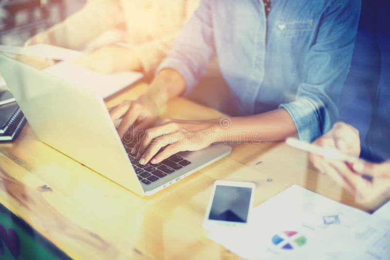 Business Team Working on Laptop, while Sitting at Office. Business ...