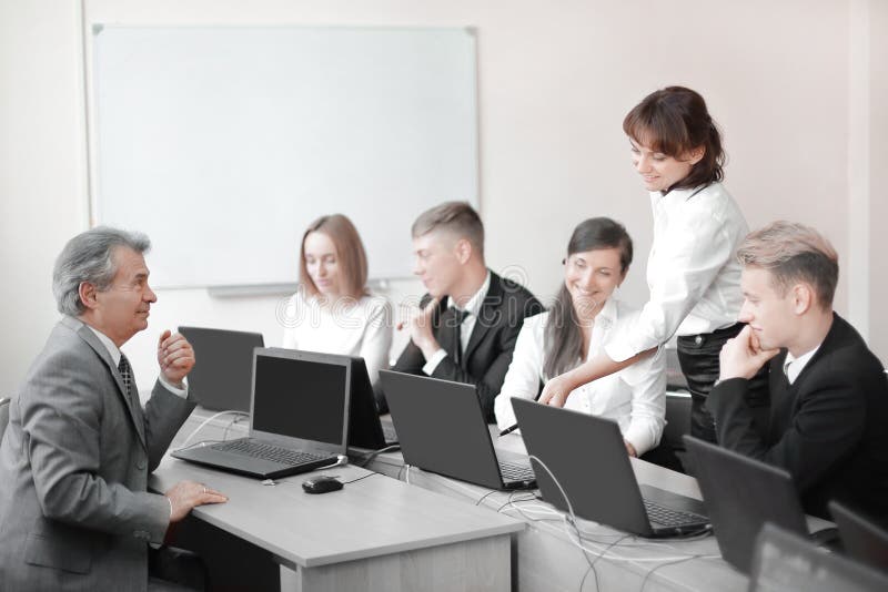 Business Team Working on Laptops in a Modern Office Stock Photo - Image ...
