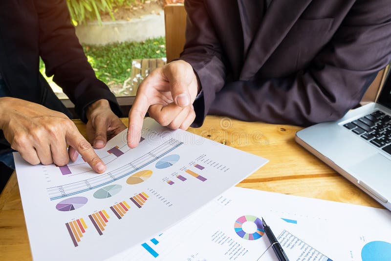 Business Team Working on a New Business Plan with Modern Digital Stock ...