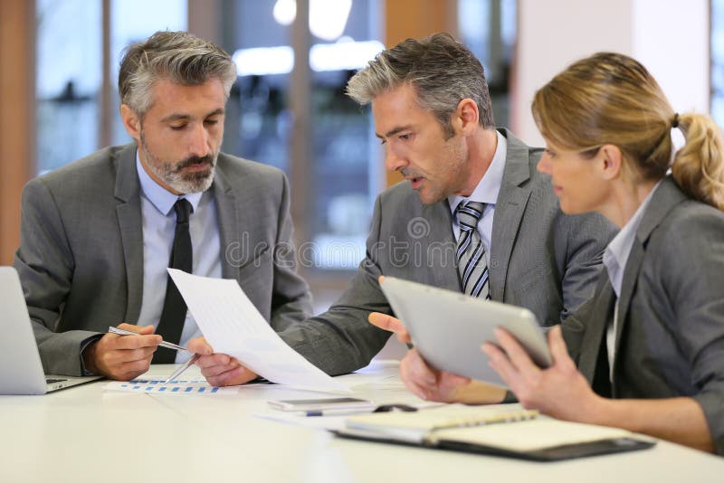 Business Team Working on Project in Office Stock Photo - Image of ...