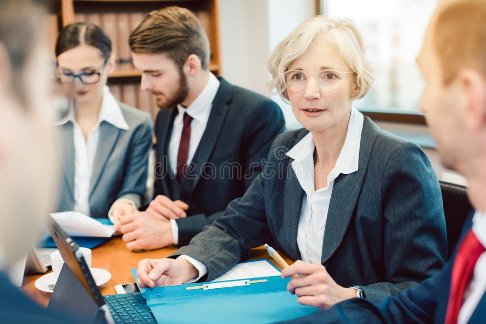 Business Team Working on Some Exciting Project Stock Image - Image of ...
