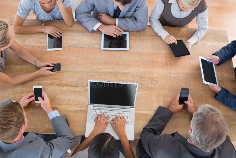 Business Team Working on Their Multimedia Devices Stock Photo - Image ...