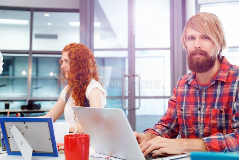 Co-workers Working Together Stock Photo - Image of desktop, tablet ...