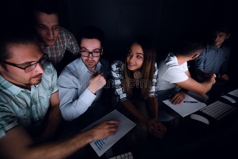 Business Team Works in the Office at Night. Stock Image - Image of ...