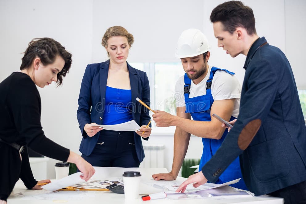 Business, Technology and Office Concept, a Team of Four Engineer Stock ...