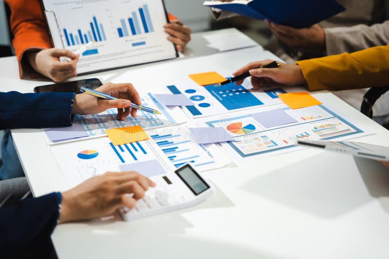 Business, Technology and Office Concept - Business Team with Laptop ...