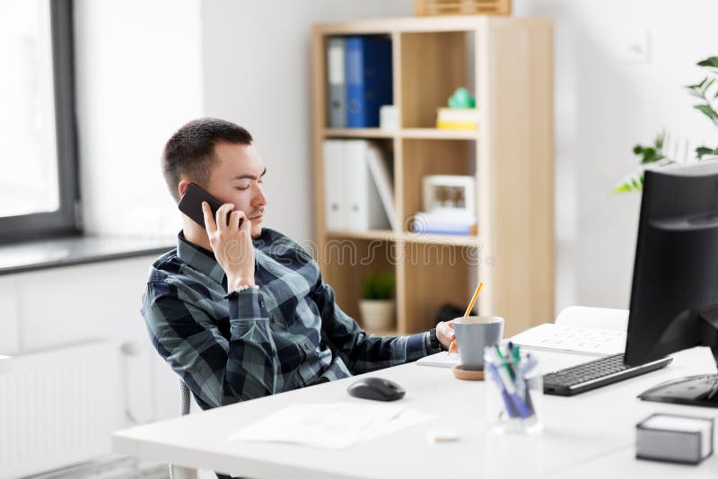 Creative Male Calling on Smarphone at Office Stock Image - Image of ...