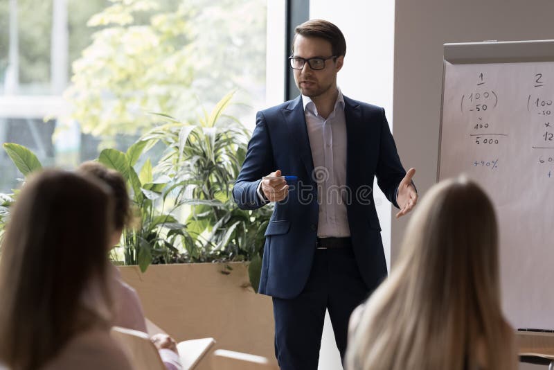 Business Trainer Makes Speech during Corporate Training in Office Stock ...