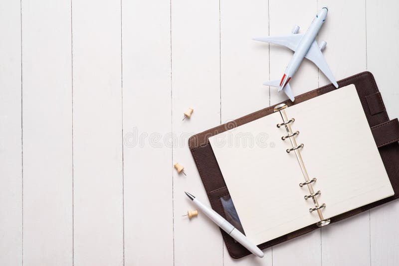 Business Trip Concept. Airplane and Blank Open Notebook for Your Stock ...