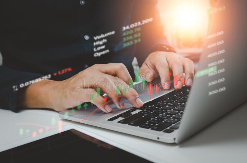 Business Using Computer Laptop and Analysing the Financial Data Graph ...