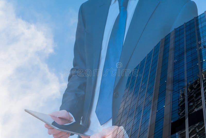 Business Vision and Success. Man Holds Tablet in Front of Office ...