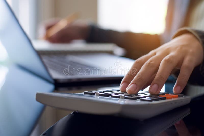 Hand using calculator stock photo. Image of hand, calculator - 207555314