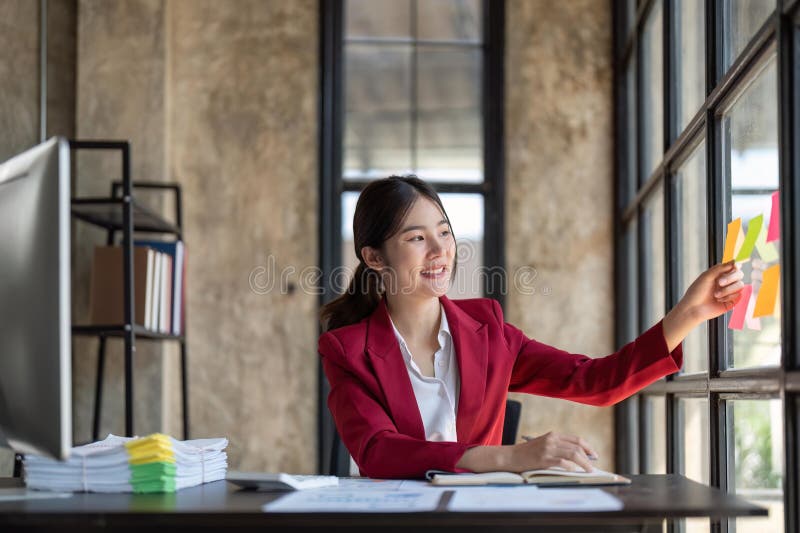 Business Woman Analyzing Process Schedule, Planning Tasks on Colorful ...