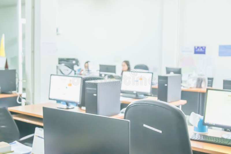 Business Woman Blur in the Workplace at Sitting with Desk Computer ...