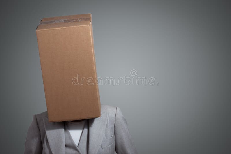 Young Woman Gesturing with a Cardboard Box on Her Head with Smiley Face ...