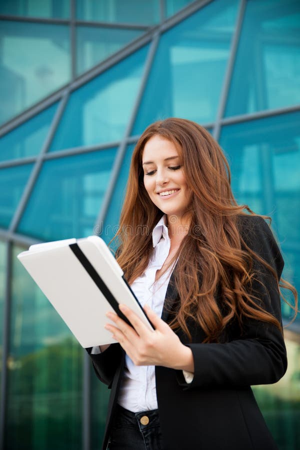 Business Woman Checking Data on Her Tablet Computer Outdoor Stock Photo ...