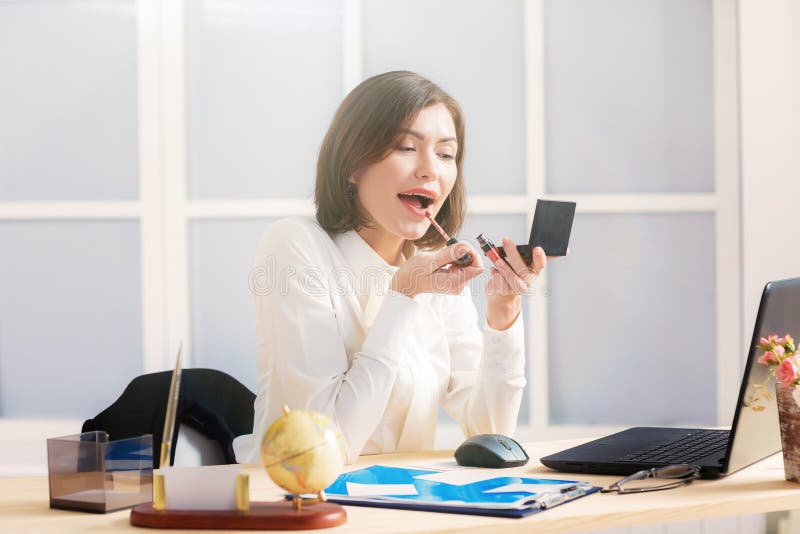 Business Woman Doing Makeup at the Office Stock Image - Image of ...