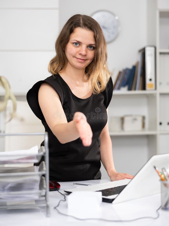 Business Woman Extending Her Hand for Handshake in Modern Office Stock ...
