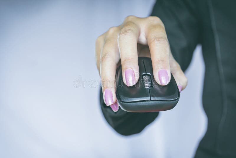 Woman hand holding mouse stock photo. Image of office - 42163168