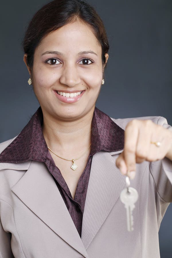 Business Woman Holding a Key Stock Image - Image of fresh, expressive ...