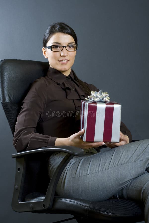 Business Woman Holding a Present Stock Photo - Image of model ...