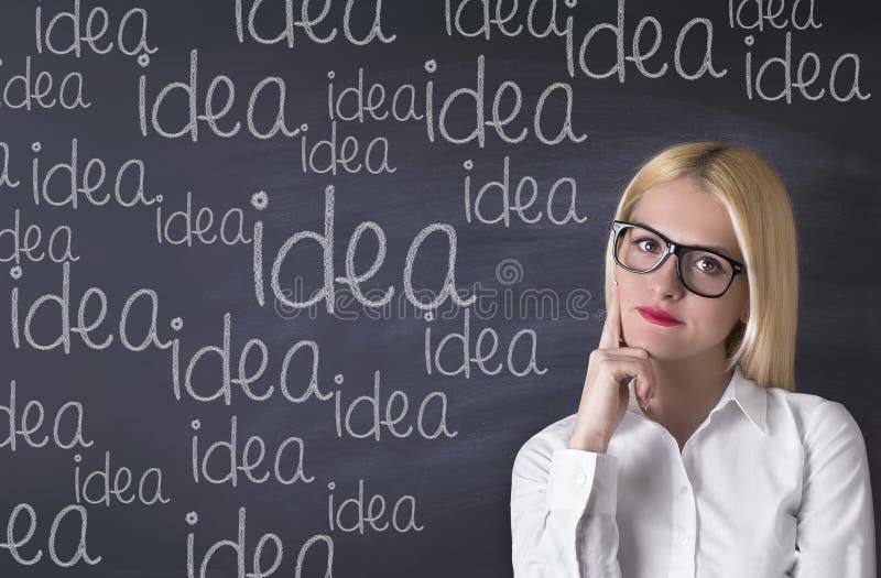 Business Woman with ideas stock image. Image of blackboard - 208676881