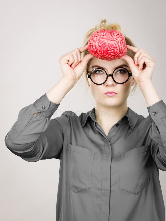 Business Woman Intensive Thinking Holding Brain Stock Image - Image of ...