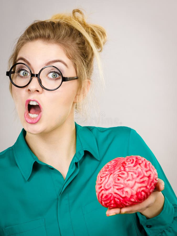 Business Woman Intensive Thinking Holding Brain Stock Image - Image of ...