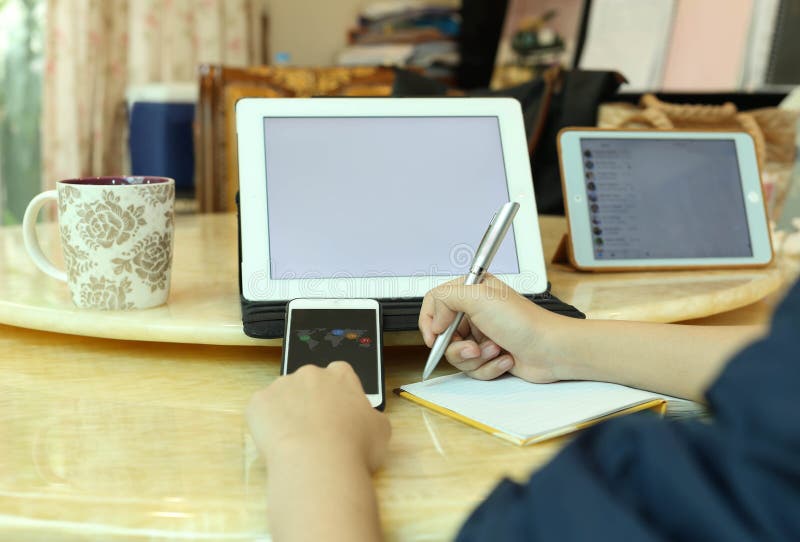 Business Woman Making Notes and Using a Tablet Stock Photo - Image of ...