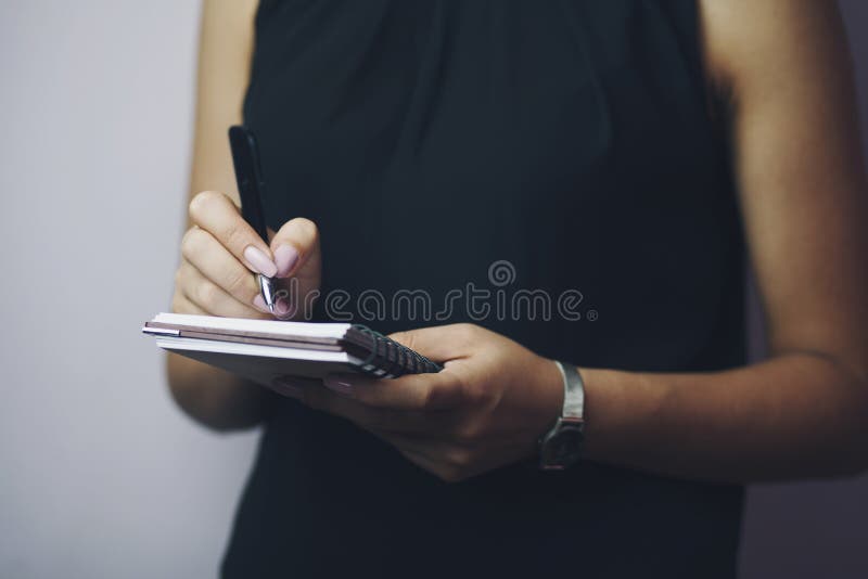 Woman hand notebook stock photo. Image of information - 134426156