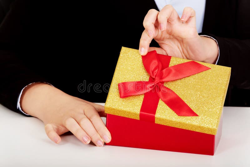 Business Woman Opens a Gift Box Behind the Desk Stock Photo - Image of ...