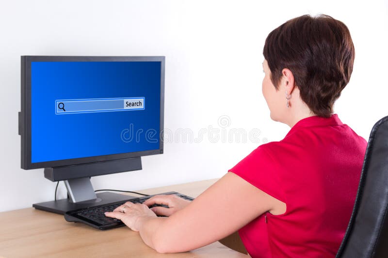 Woman Searching Something in Internet with Personal Computer in Stock ...