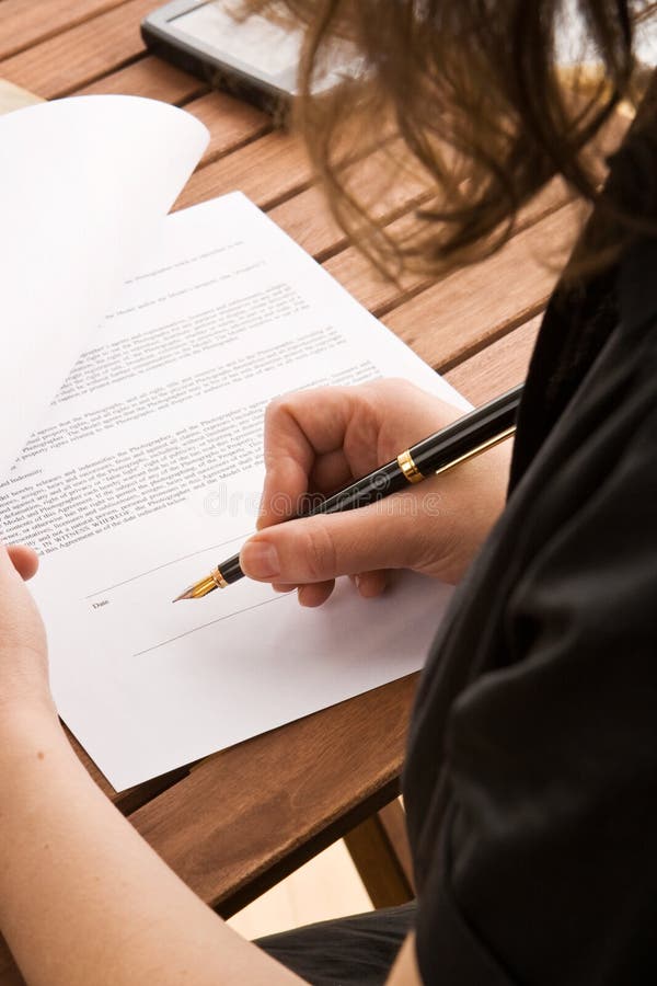Close Up on a Woman Hands Signing a Contract Stock Image - Image of ...