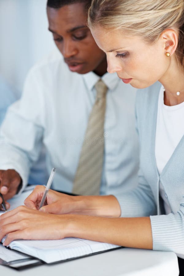 Business Woman Taking Down Notes in a Meeting Stock Photo - Image of ...