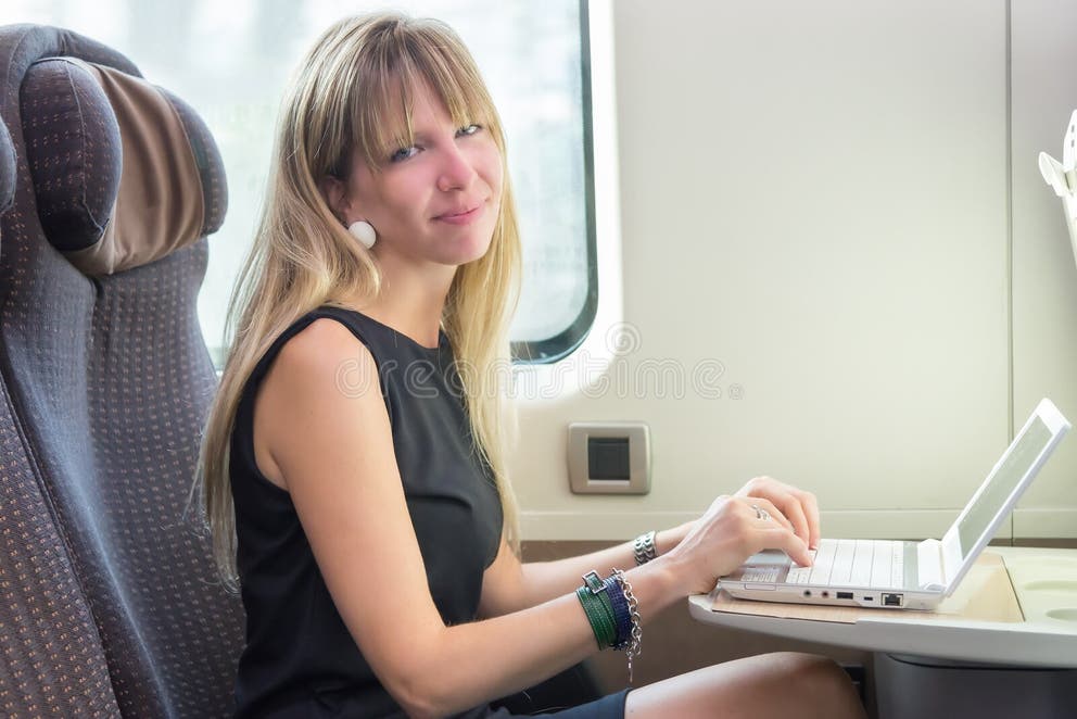 Business Woman Using Computer on Train Stock Photo - Image of caucasian ...