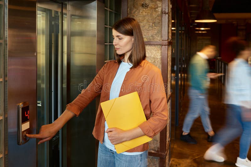 Business Woman Using Elevator in Hall of Coworking Office Stock Image ...