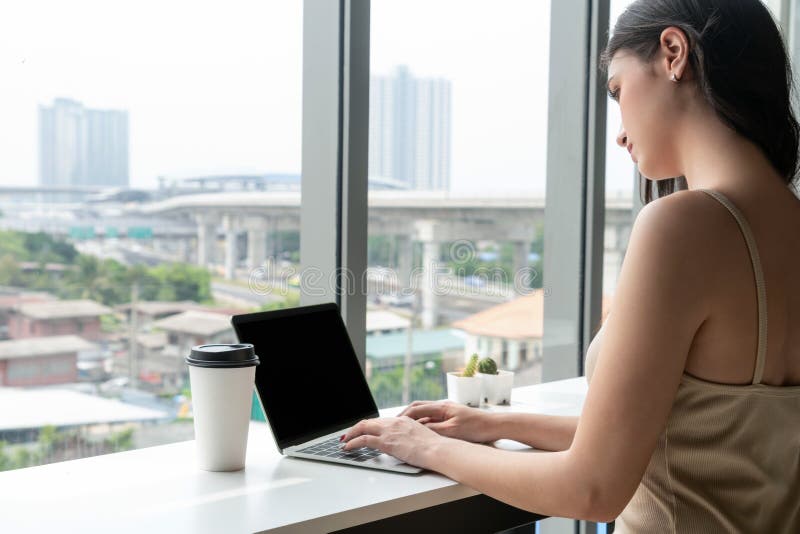 Business Woman Using Laptop Computer at Cafe. Stock Image - Image of ...
