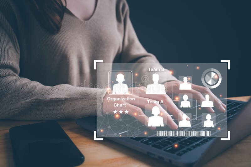Business Woman Using Laptop Computer with Organigram on Virtual Screen ...