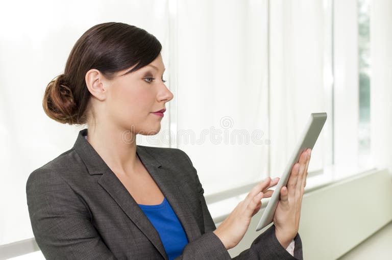 Business Woman Using a Tablet Computer Stock Photo - Image of ...