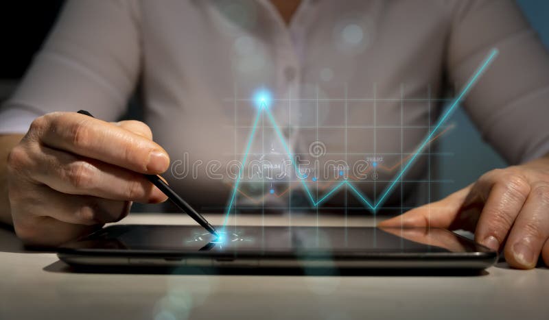 Business Woman Using Tablet with Holographic Financial Graph, Analysis ...