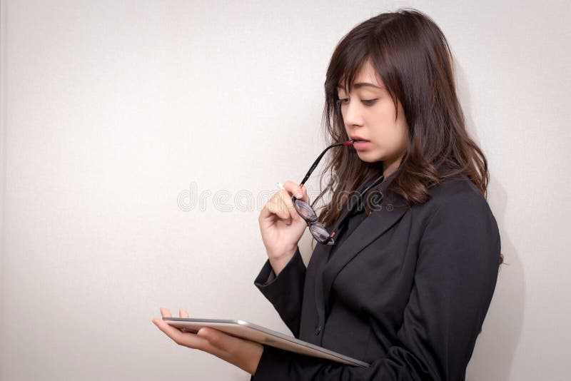 Business Woman Using a Touch Pad Tablet. Concept for Business Stock ...