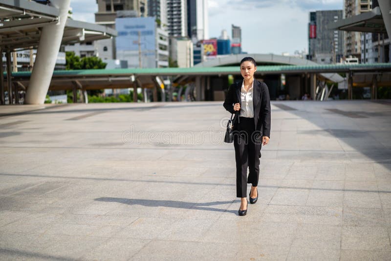 Business Woman Walking In City Stock Photo - Image of nonsi, outdoors ...