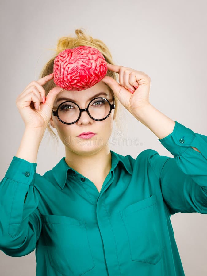 Business Woman Intensive Thinking Holding Brain Stock Photo - Image of ...
