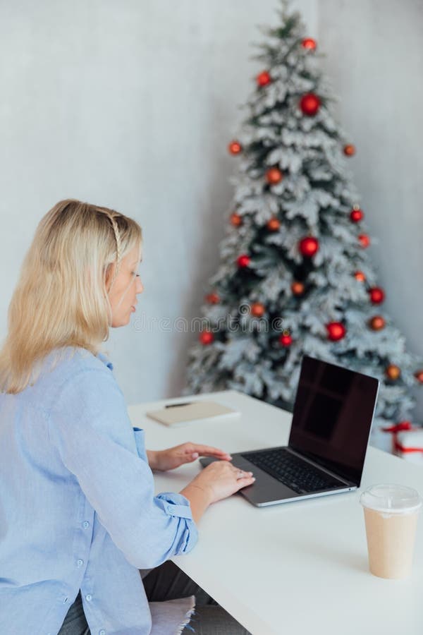 Business Woman Working Behind Computer in Christmas Office Stock Photo ...