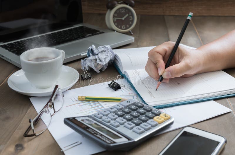 Calendar with a Note Lies on a Wooden Table Stock Image - Image of ...