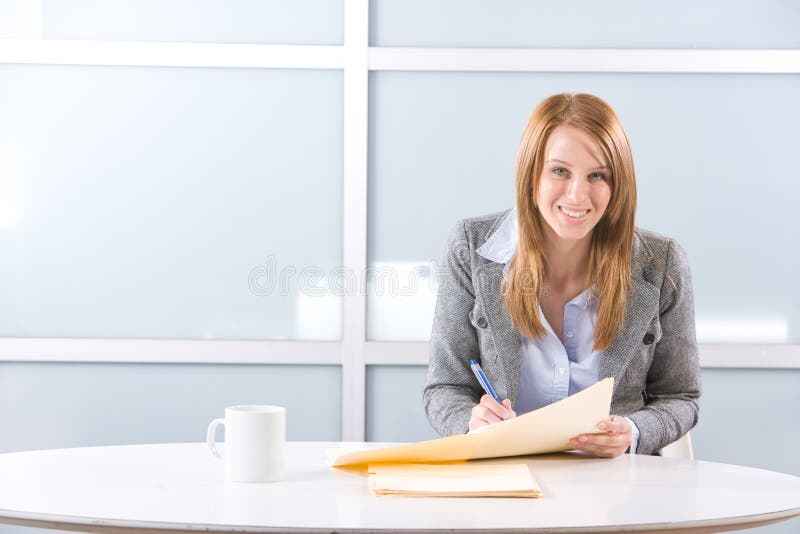 Business Woman Writing Notes at Desk Stock Image - Image of lecture ...